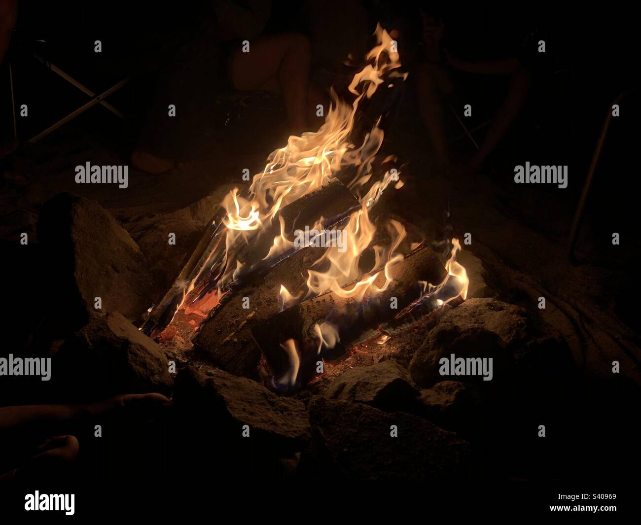 Burning campfire in wind hi-res stock photography and images - Alamy