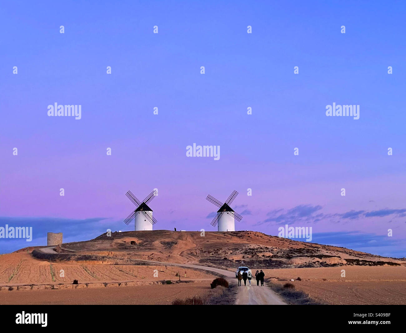Windmills at dusk. Tembleque, Castilla La Mancha, Spain Stock Photo - Alamy