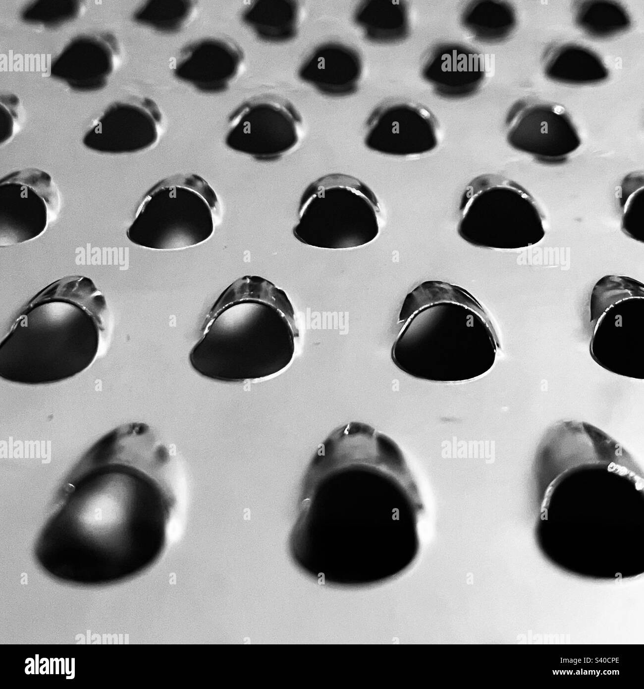 Holes in cheese Black and White Stock Photos & Images - Alamy