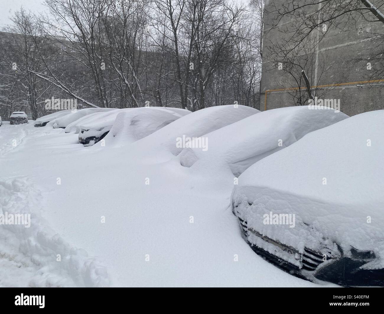 Parking lot covered in snow Stock Photo - Alamy