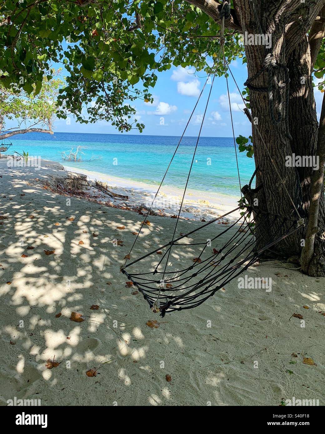 Maldivian and swing hi-res stock photography and images - Alamy