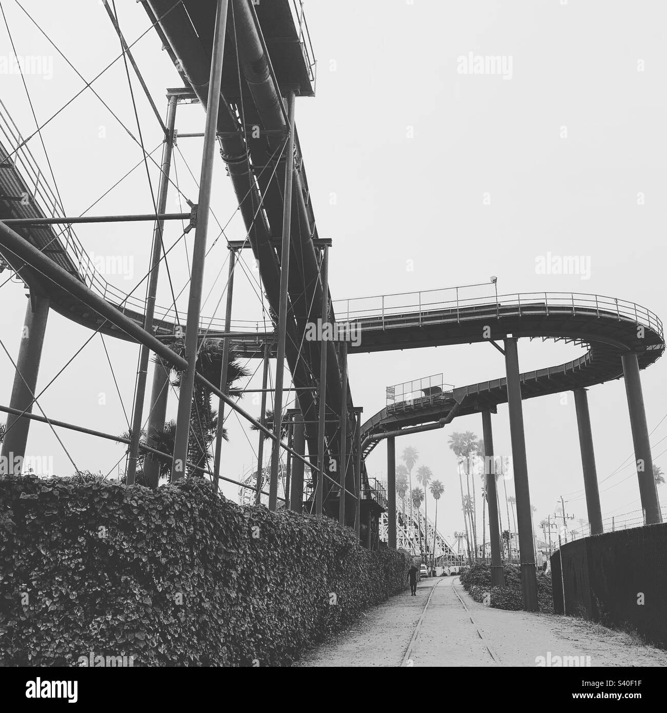 June, 2022, Under a roller coaster on a foggy morning prior to opening ...