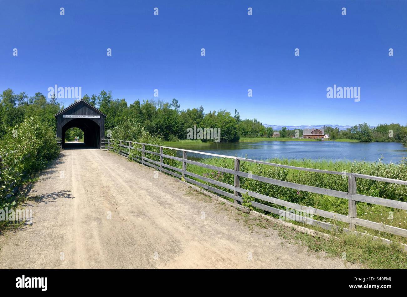 Covered bridge in summer hi-res stock photography and images - Alamy