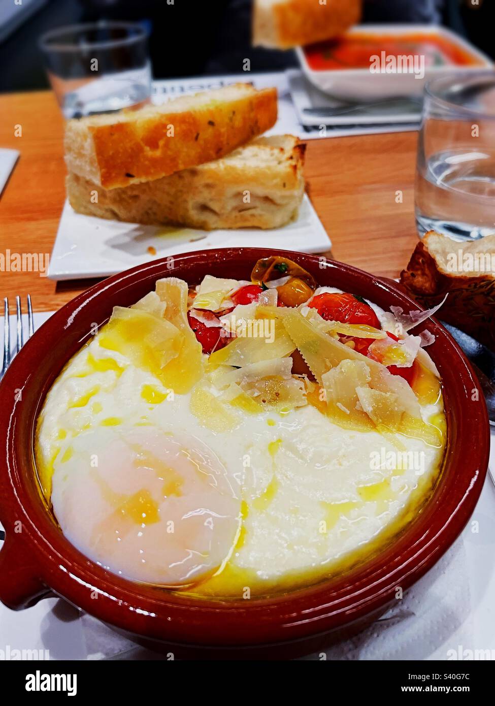 An entrée meal of stone ground polenta served with gluten-free ...