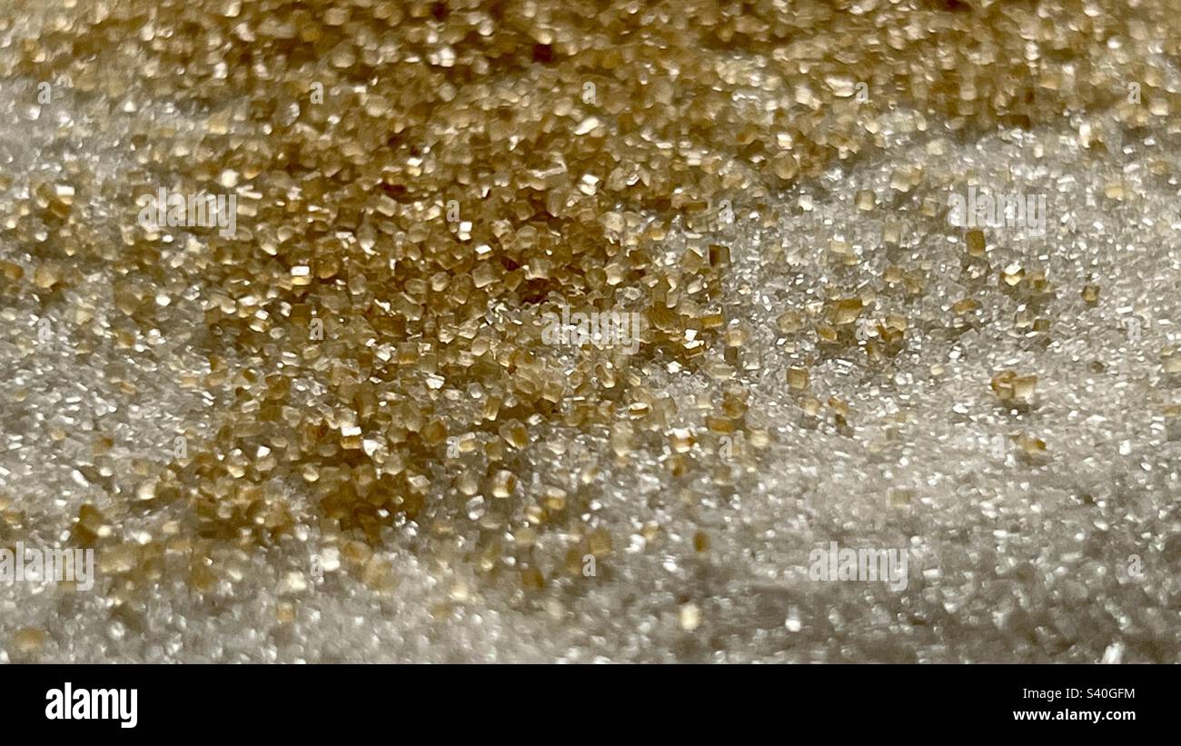 Macro shot brown sugar crystals on lighter color sugar crystals Stock ...