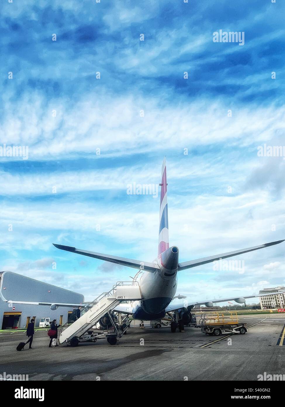 Boarding the plane - people boarding a British Airways City Flyer ...