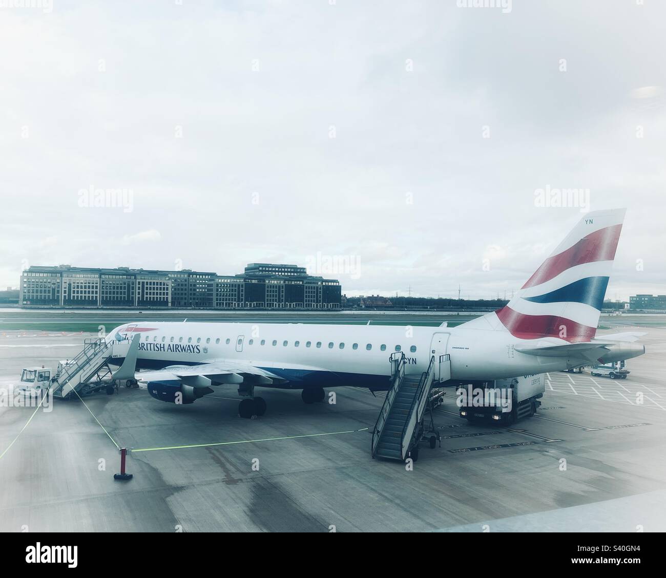 British Airways aircraft Embraer 190 on the tarmac at London City ...