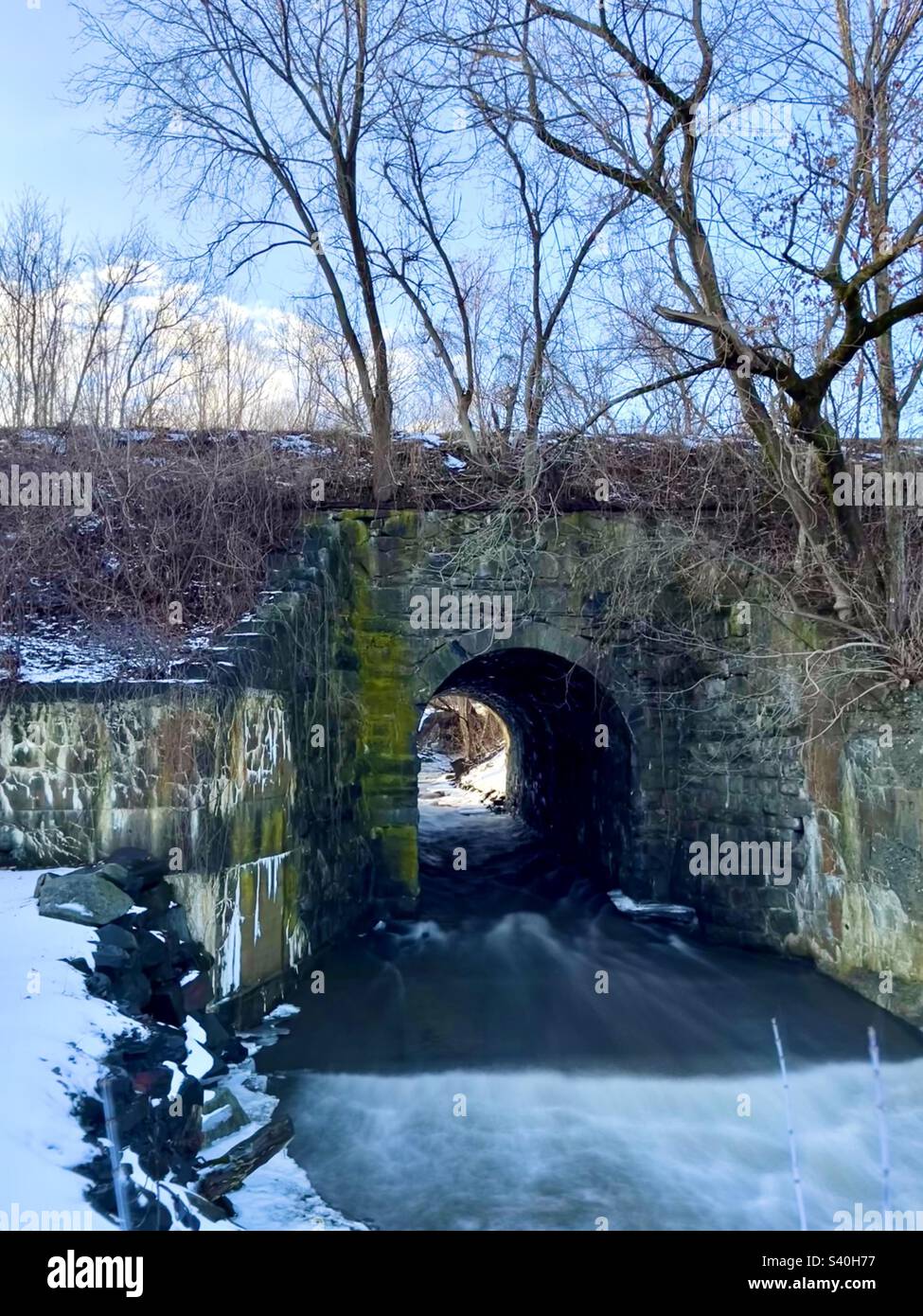 Train under river hi-res stock photography and images - Alamy