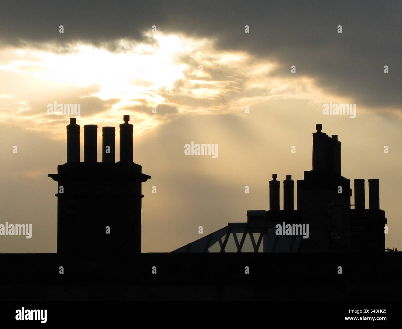 Chimney, skylight sunset. Auld Reeky Stock Photo - Alamy