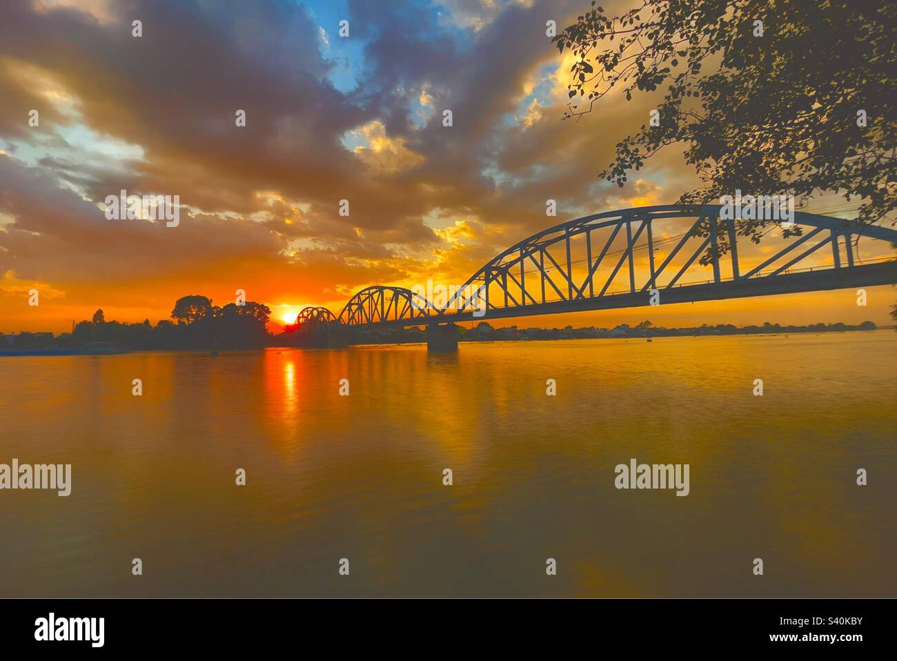 Sunset on the rapids Stock Photo - Alamy
