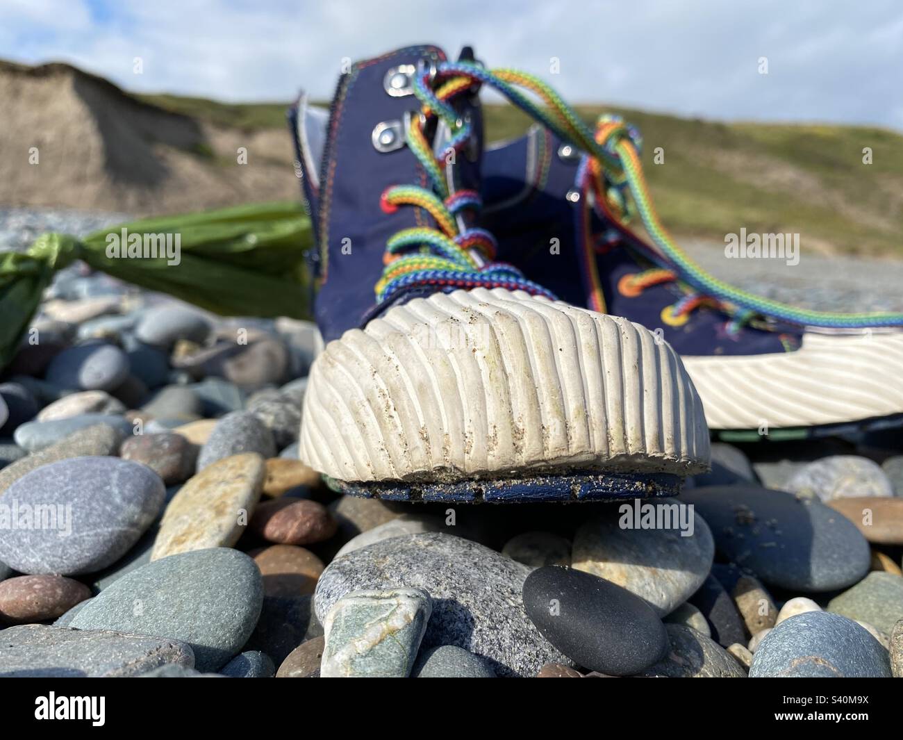 Shoes on pebble Stock Photo - Alamy
