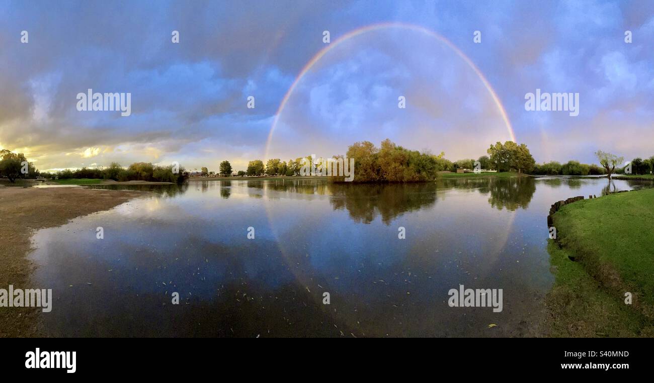 360 degree rainbow! Full rainbow reflection in pond, hint of double rainbow, panoramic, curving ...