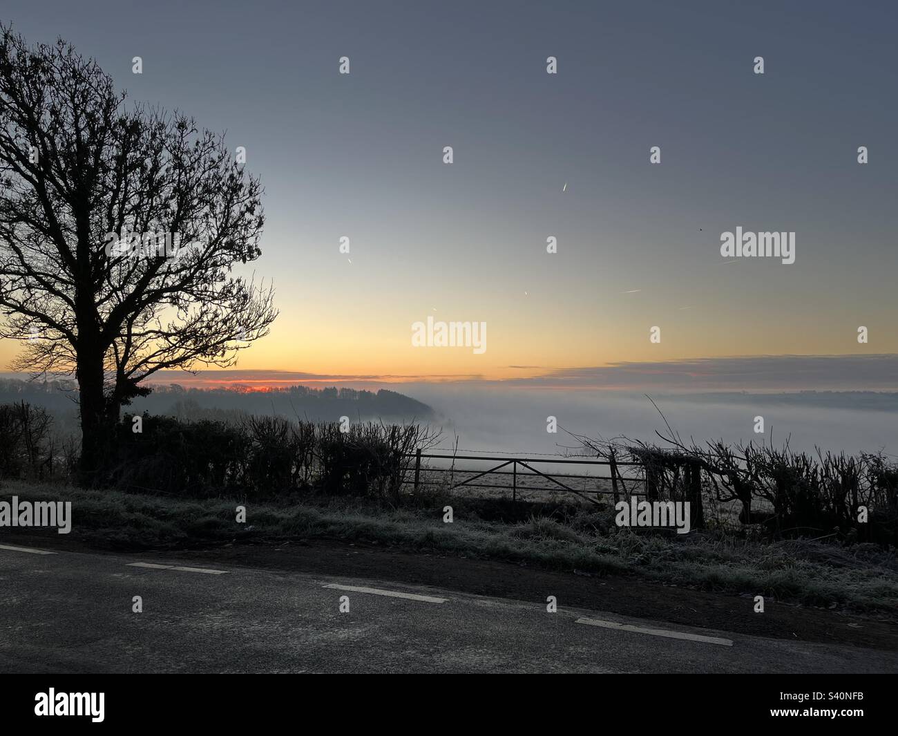 Frosty morning sunrise across countryside fields Stock Photo - Alamy