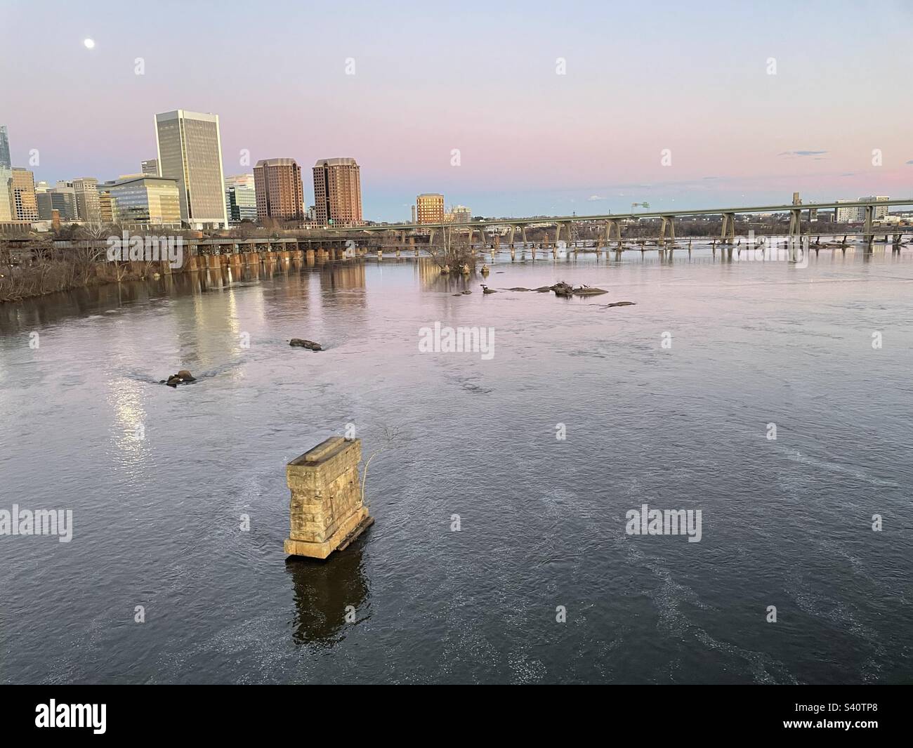 The Richmond, Virginia and James river skyline at sunset and with a ...