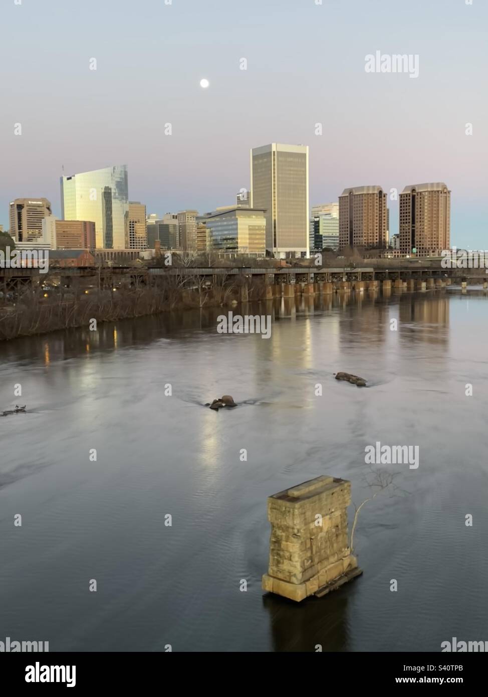 A full moon rises over the riverfront skyline of Richmond, VA Stock ...