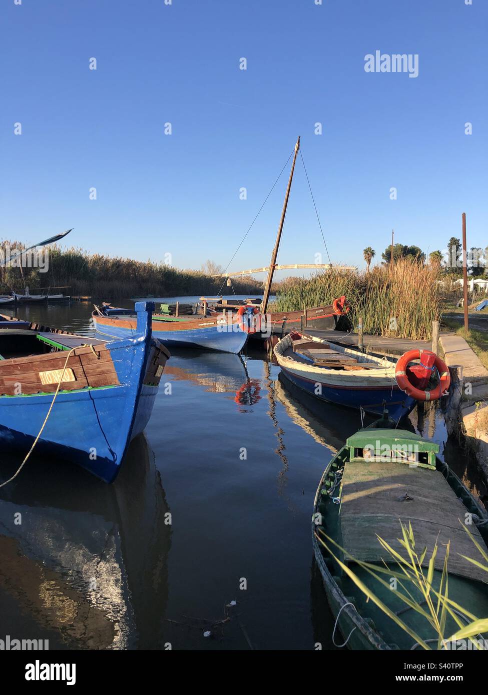 Fishing boats in canal in el palmar Valencia Spain Stock Photo - Alamy