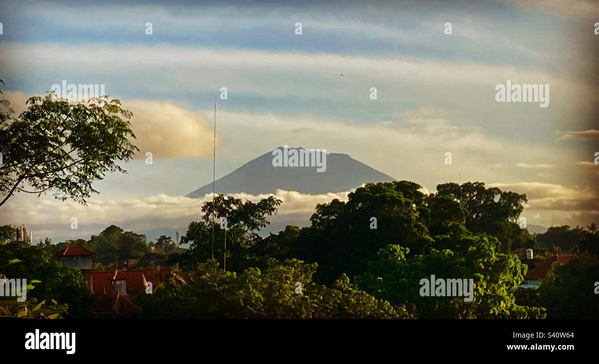 Agung volcano over the rooftops of Ubud in Bali Stock Photo - Alamy