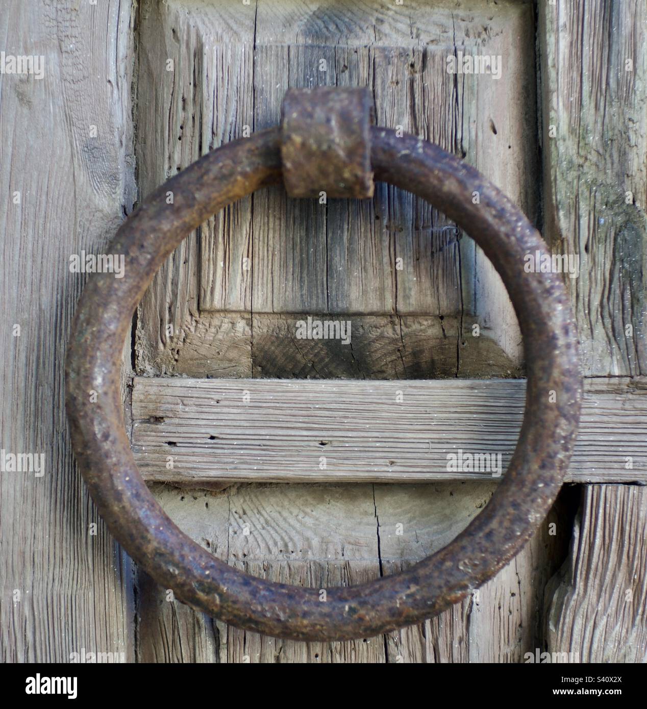 Rusted steel heavy door handle Stock Photo - Alamy