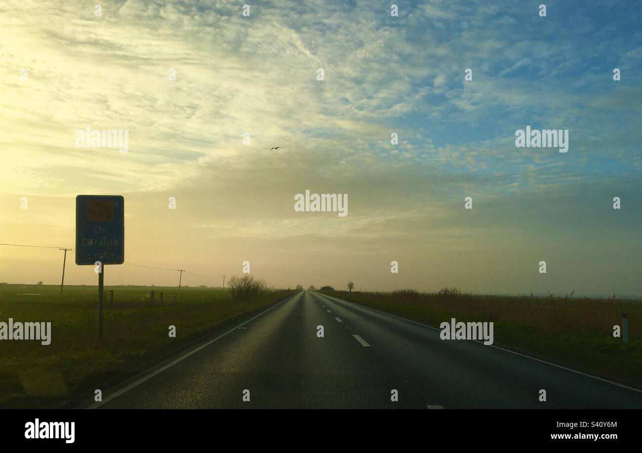 A47 acle straight, sunset empty wide road , Norfolk, UK Stock Photo - Alamy