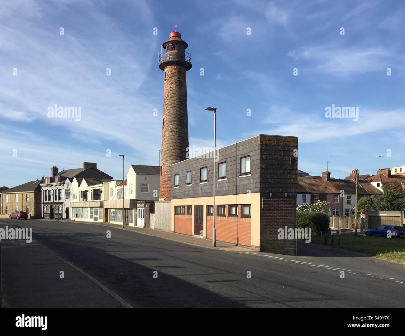Gorleston lighthouse, building on both sides, Norfolk,UK Stock Photo ...