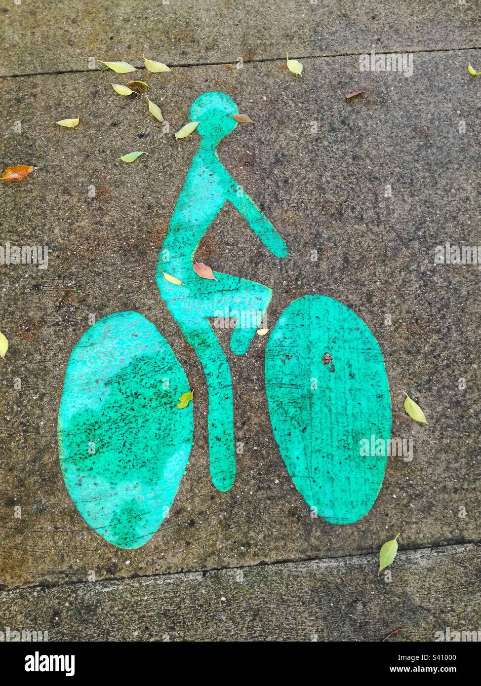 Pictogram on the floor after the rain Stock Photo - Alamy