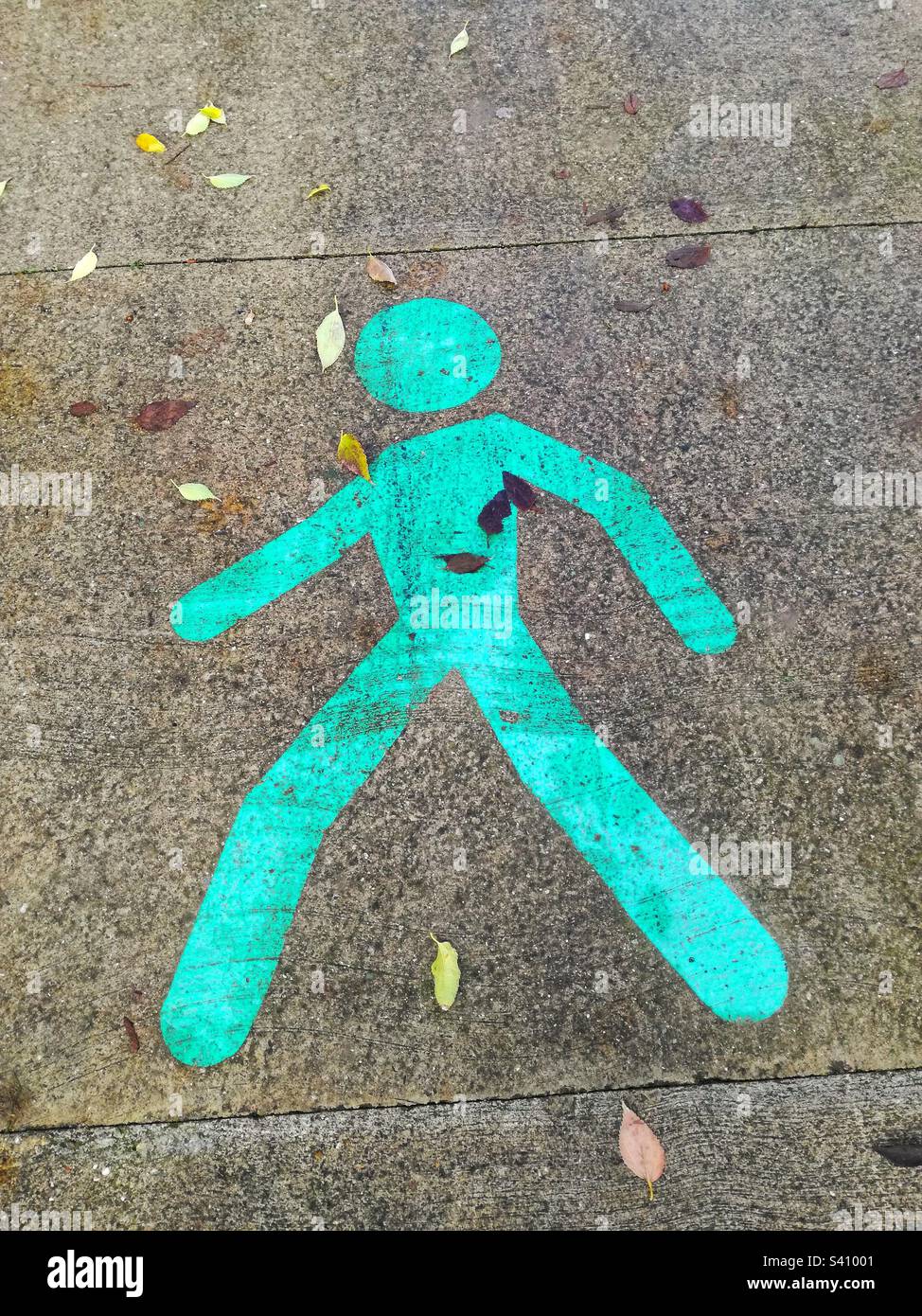 Pictogram on the floor after the rain Stock Photo - Alamy