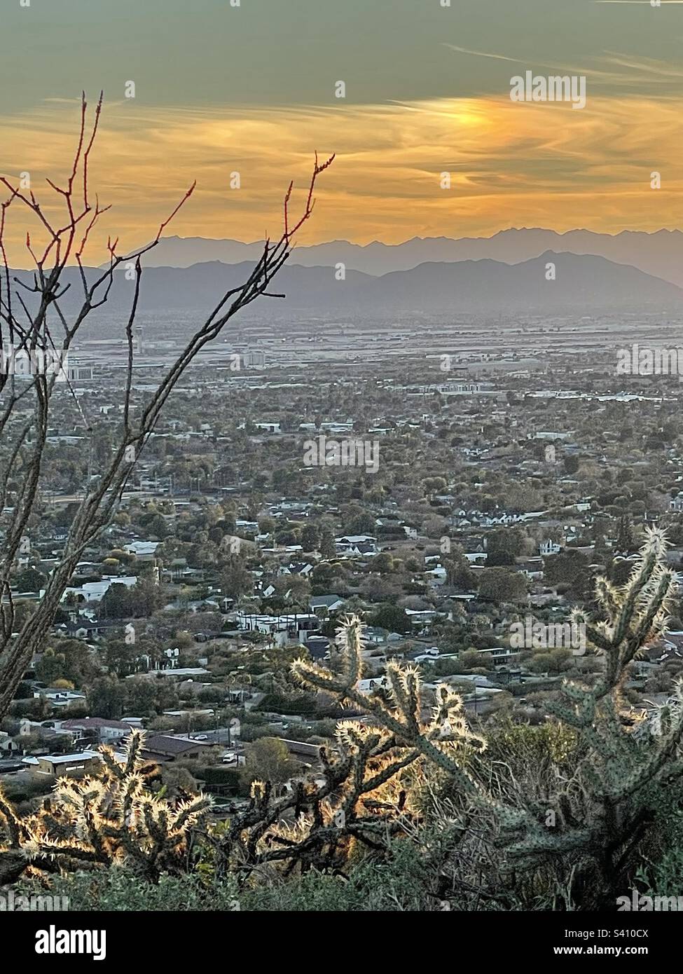 Cloudy golden sunset with sun dog, parhelion, South Mountain, Cholla ...