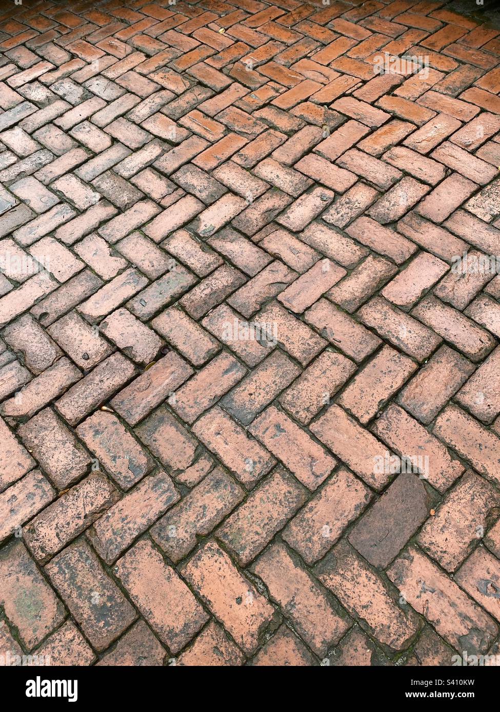 Red bricks in herringbone pattern Stock Photo - Alamy