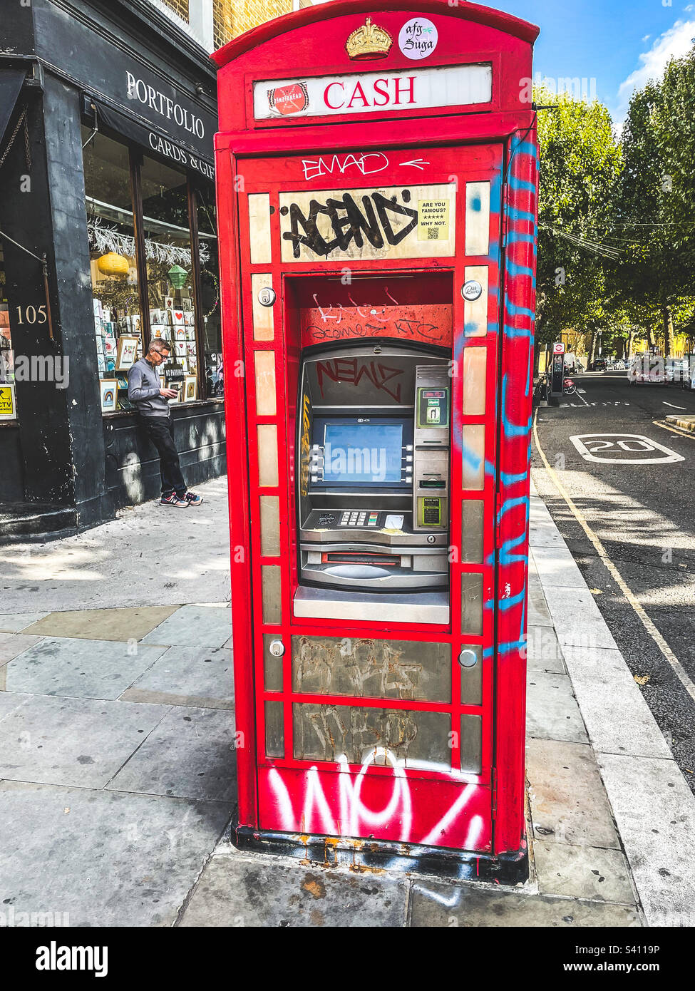 Graffiti telephone box, London Stock Photo - Alamy