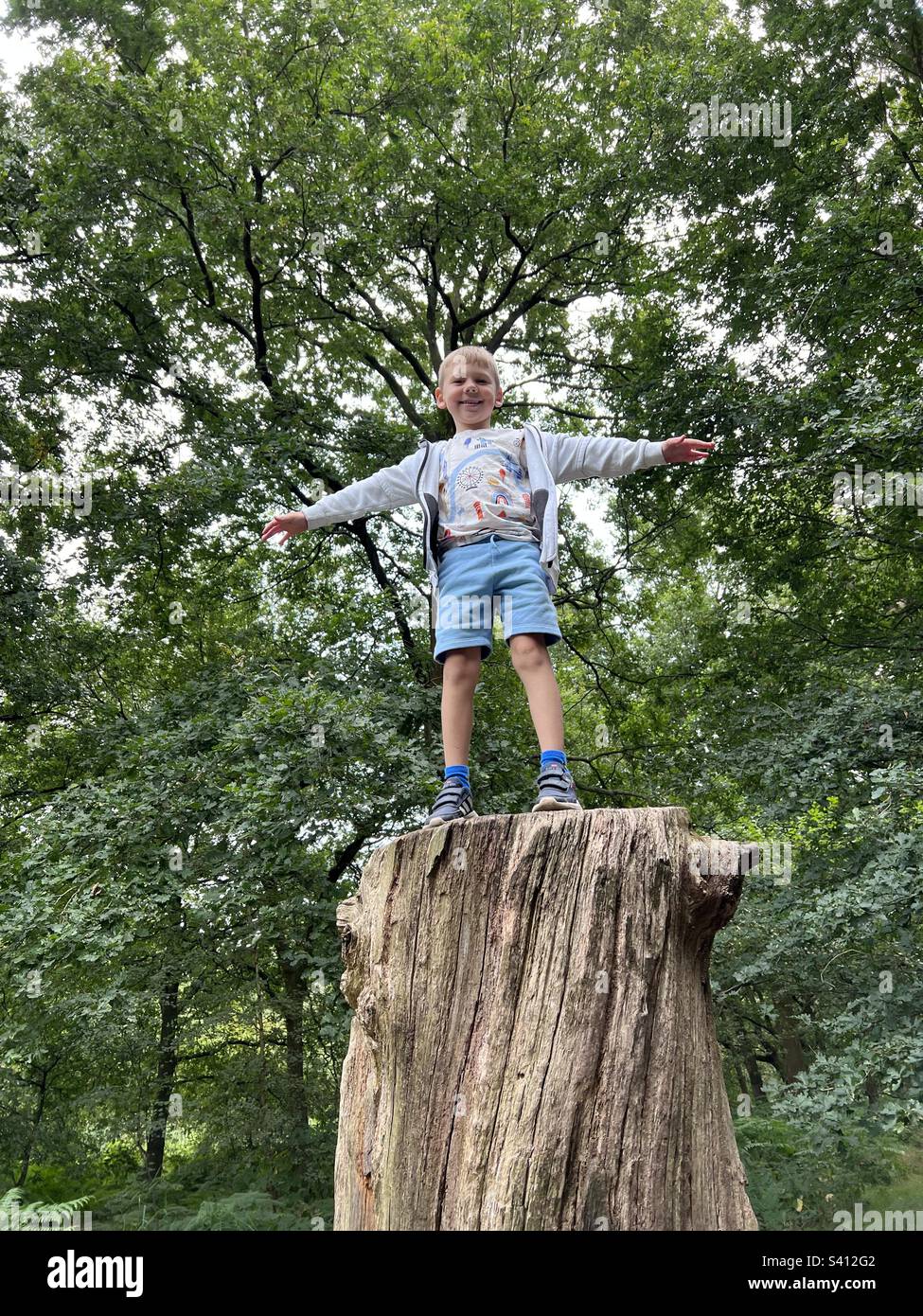 Boy stood hi-res stock photography and images - Alamy