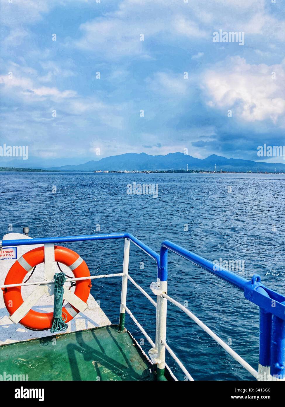 View back to Bali from the ferry to Java from Gilimanuk with ferry in ...