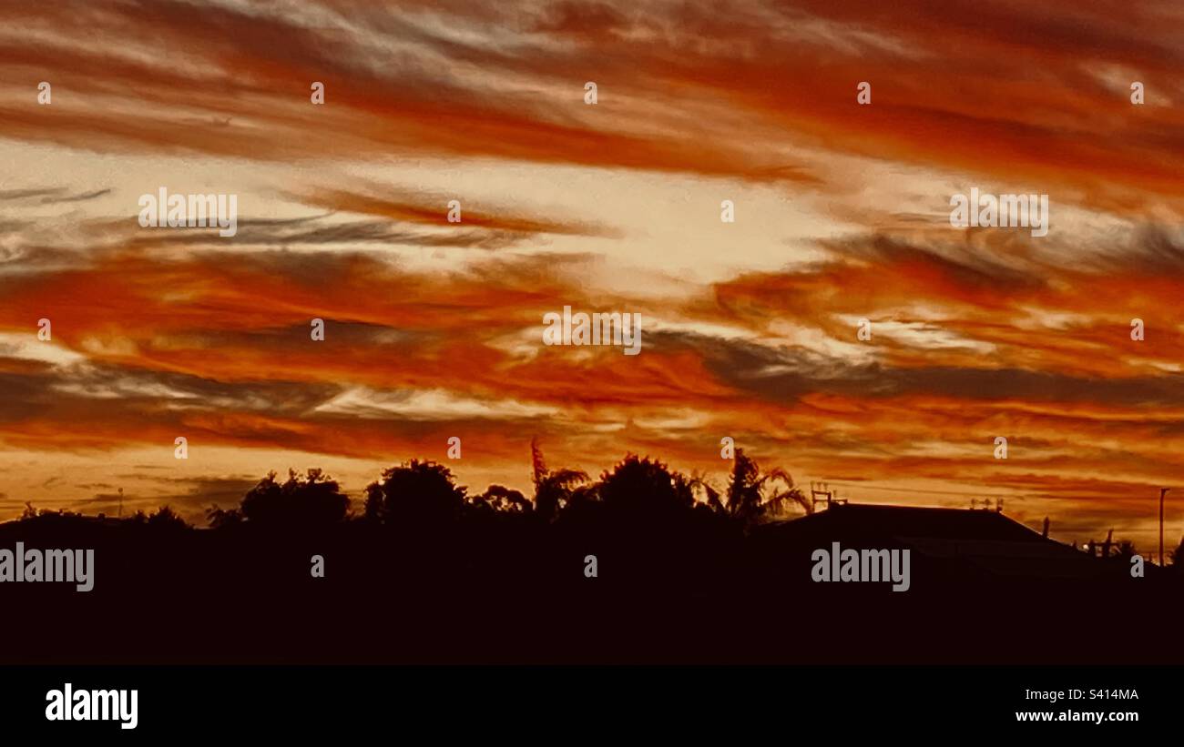 Colourful sunset with orange and red clouds Stock Photo - Alamy