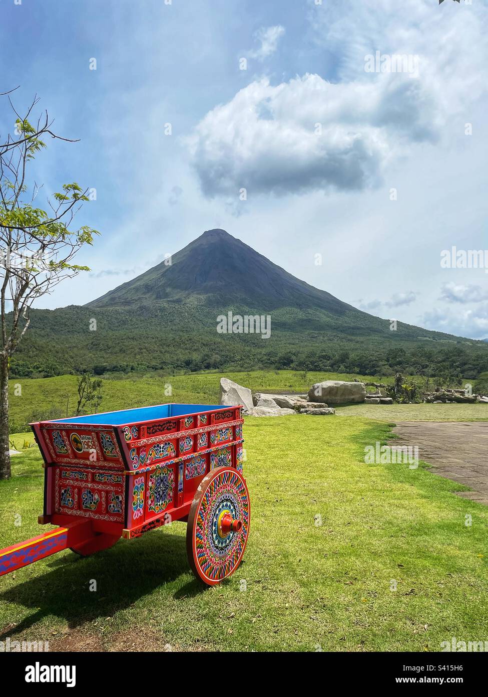 Colourful cart in front of volcano Stock Photo - Alamy