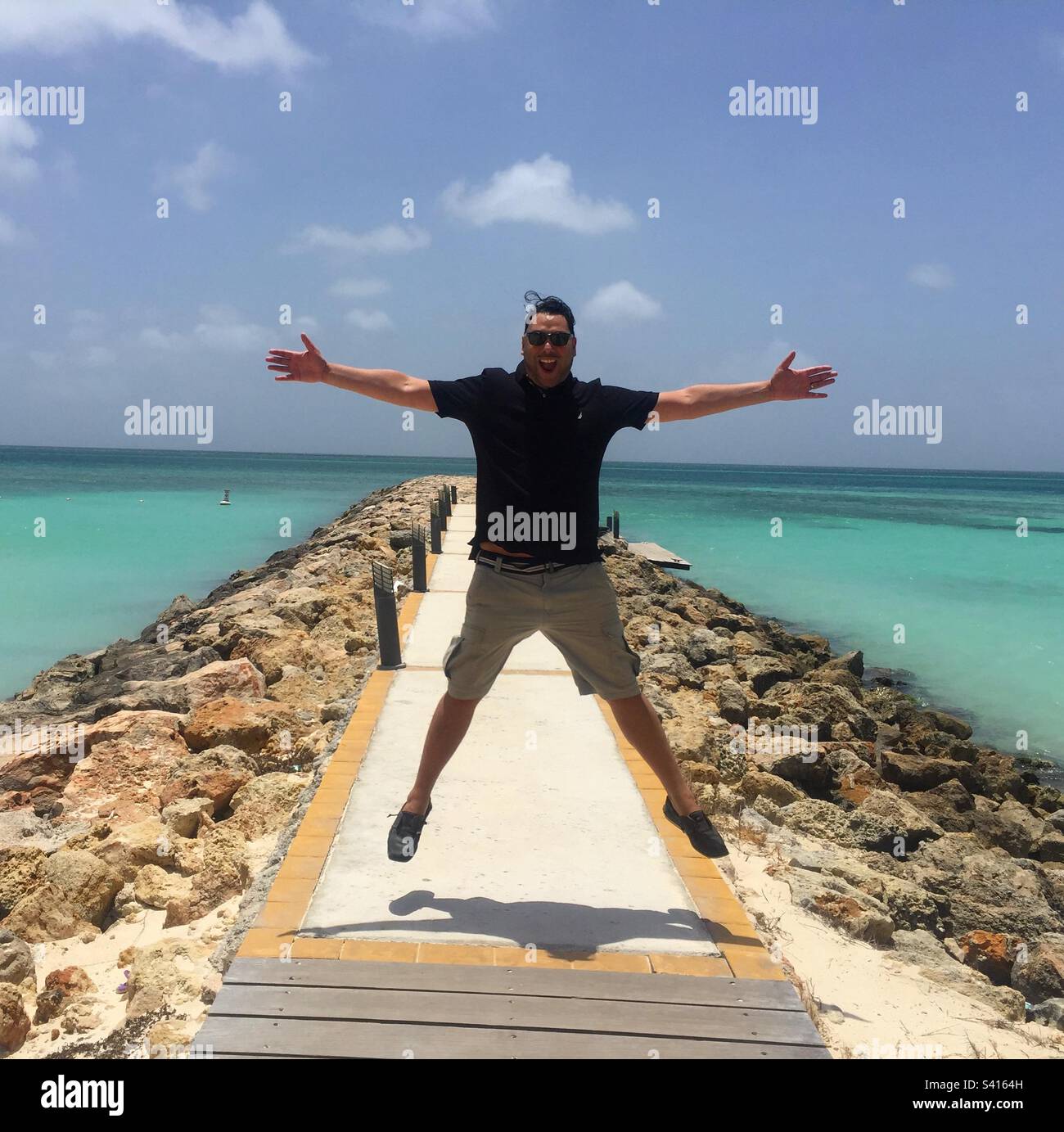 Happy Man in Aruba Stock Photo - Alamy