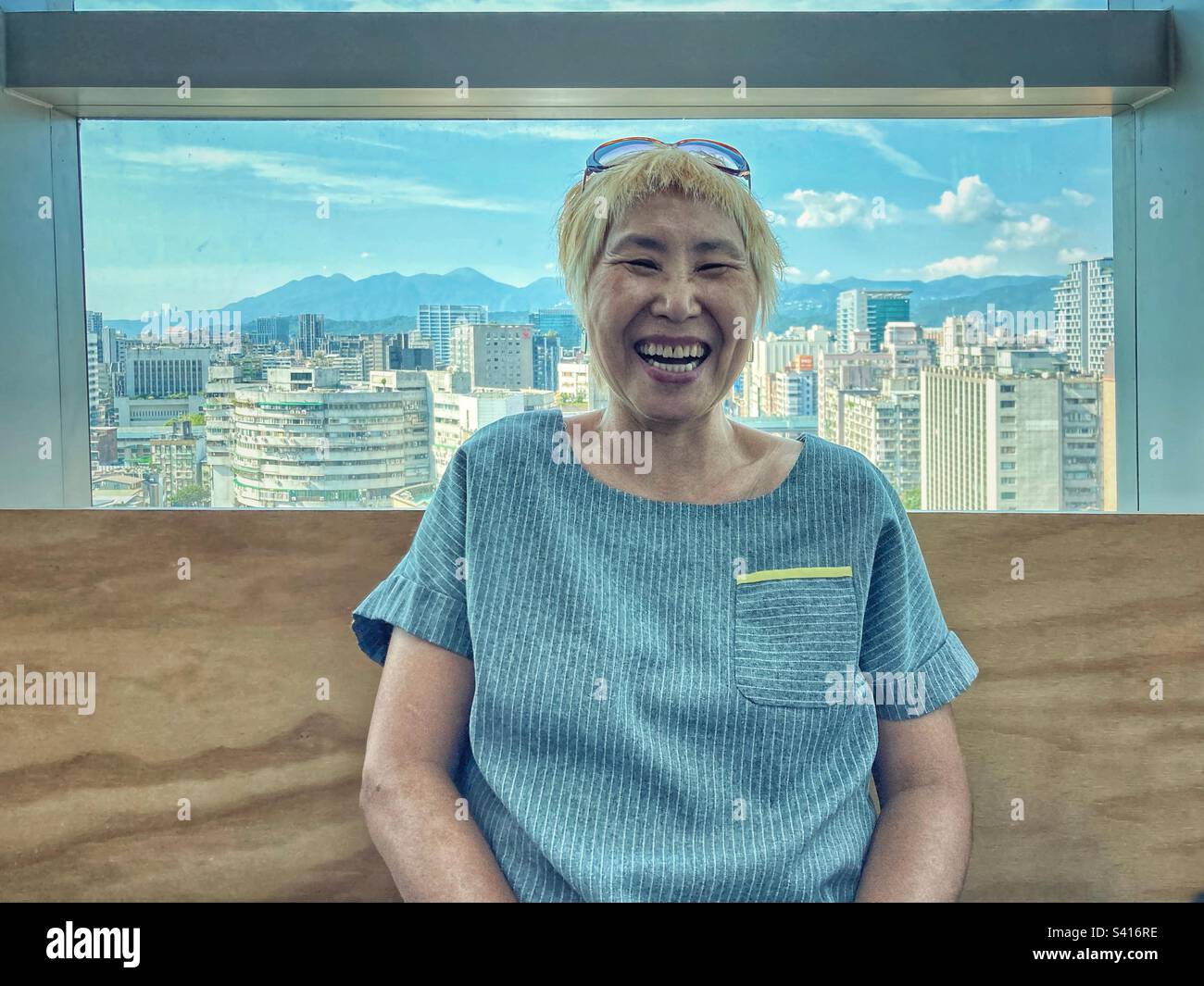 Happy senior Taiwanese / Chinese /Asian woman laughing with joy Stock ...