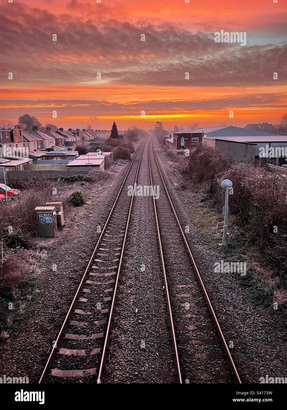 Railway lines leading into the distance on a cold January morning at ...
