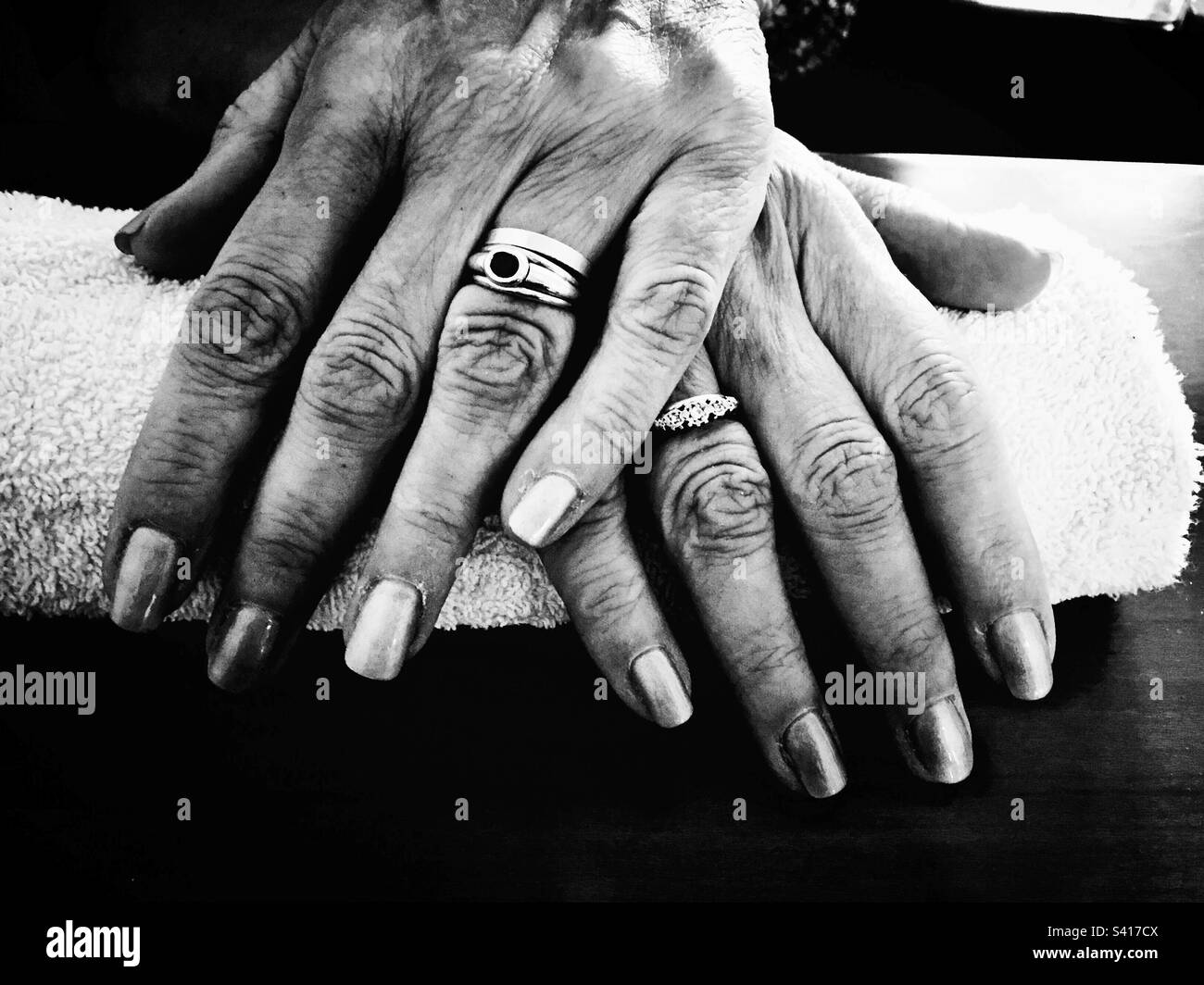 Elderly female nails receive manicure for a very important event ...