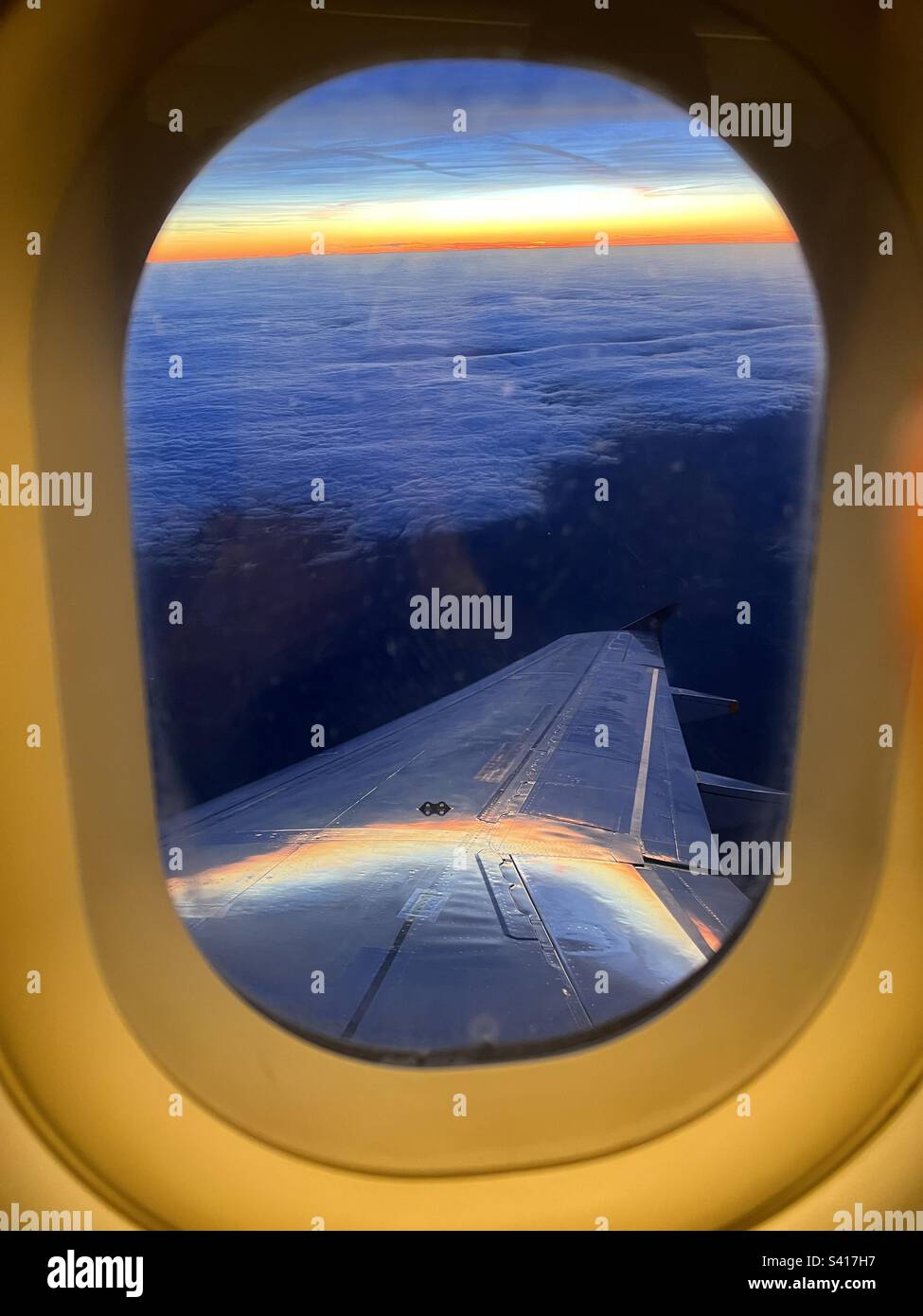 Rainbow plane window hi-res stock photography and images - Alamy