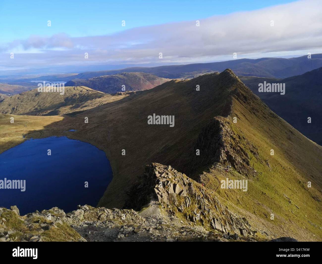 Views of the Peak District with rugged hills and lake near Studley Edge ...