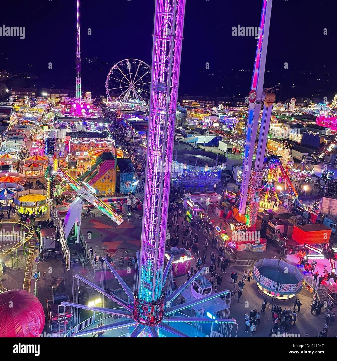 Hull fair neon lights from the ferris wheel Stock Photo - Alamy