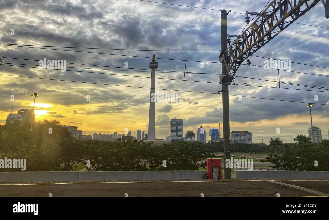 View of the Monas and Jakarta out of train window as pull up at Gambir ...