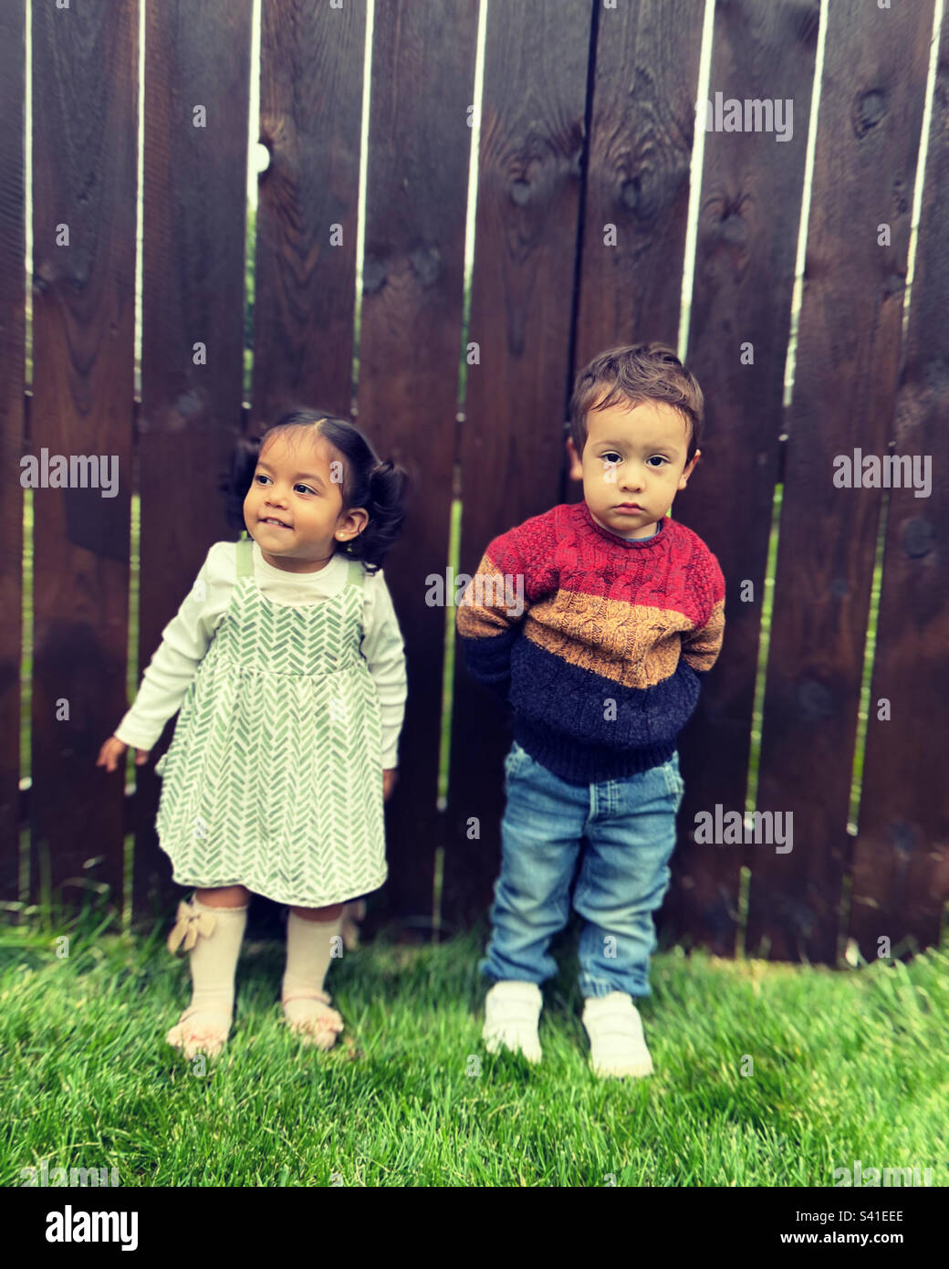 Standing behind wood fence hi-res stock photography and images - Alamy