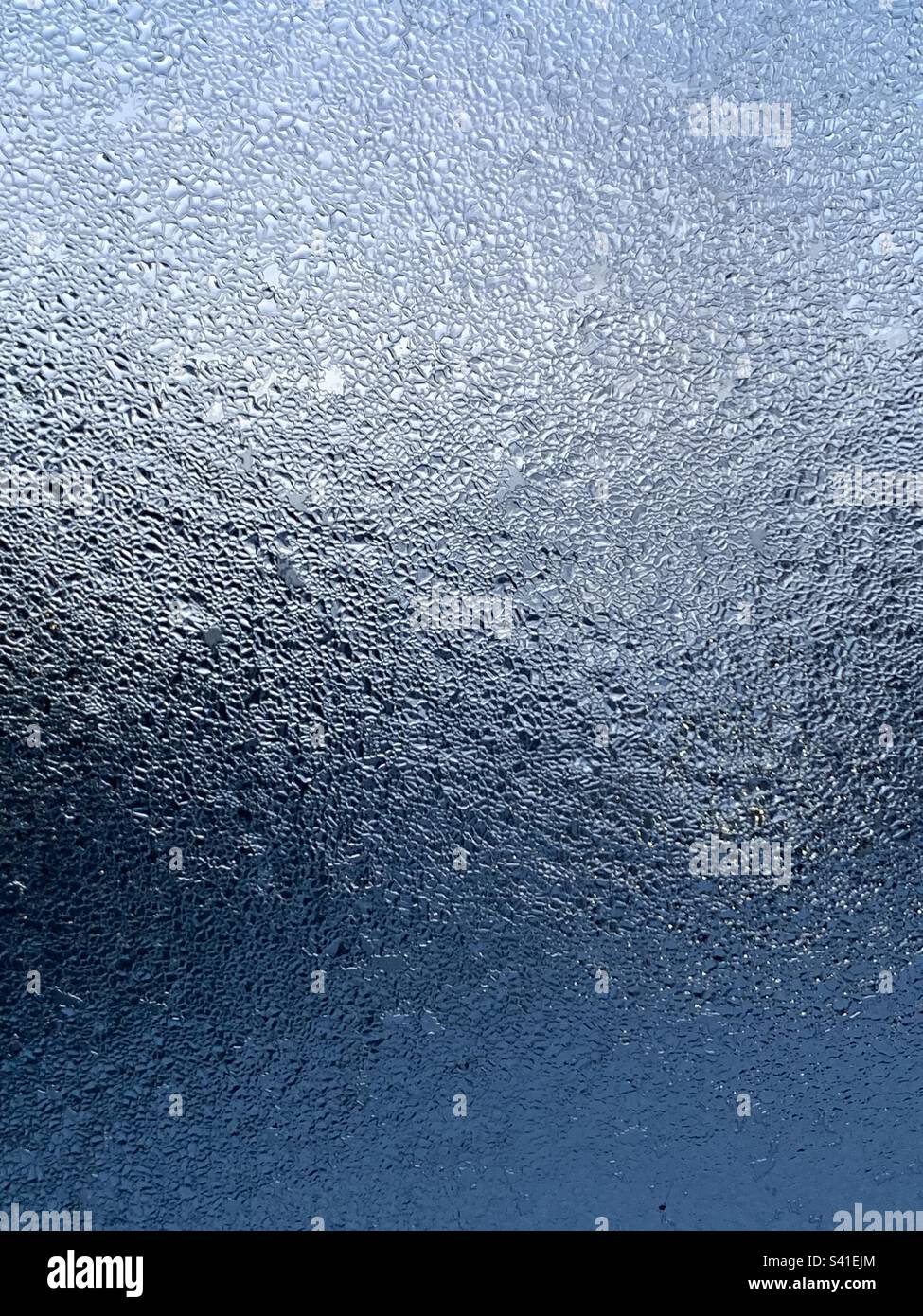 Pebbled ice on a window Stock Photo - Alamy