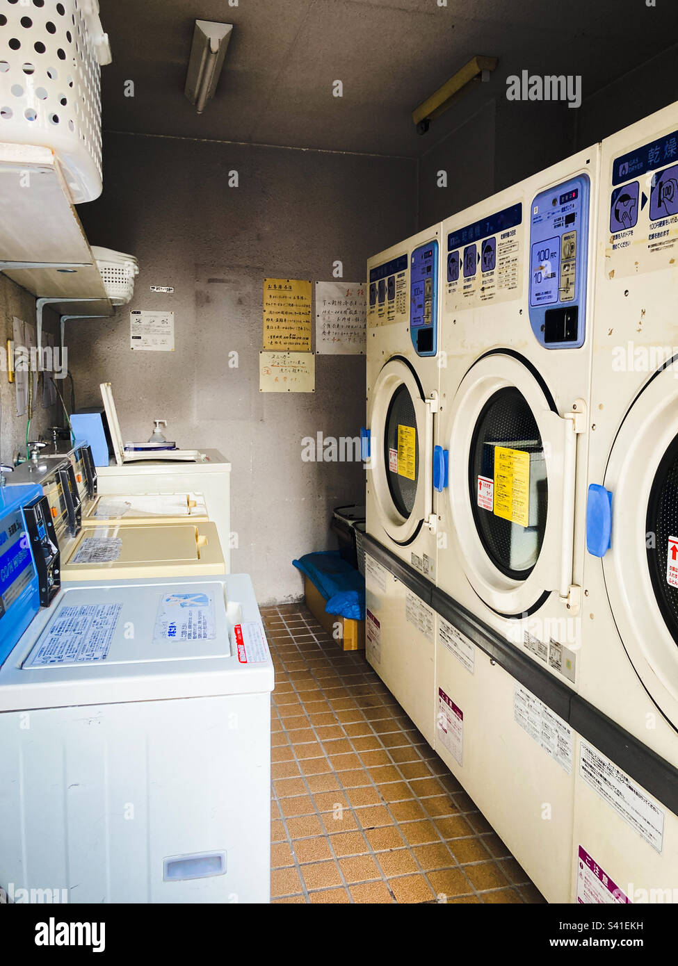 A peek into a Japanese coin laundry Stock Photo - Alamy