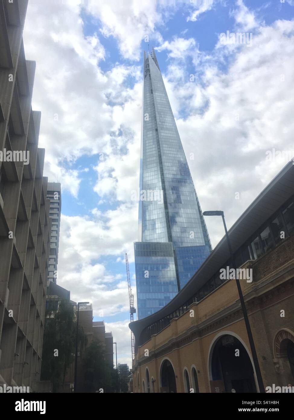 Stunning view of The Shard with white clouds and blue sky Stock Photo ...