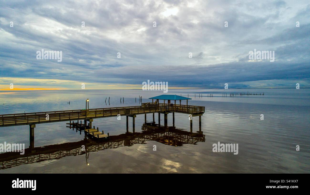 Overcast sky at sunset on Mobile Bay Stock Photo - Alamy