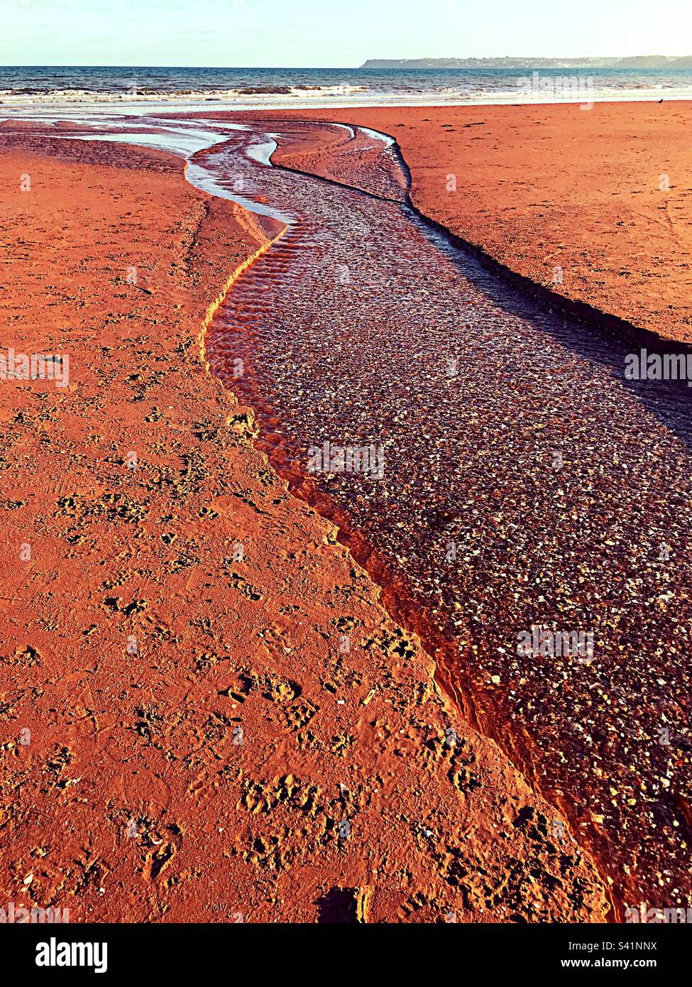 Sea divided by water inlet into the English Channel in Preston Paignton ...