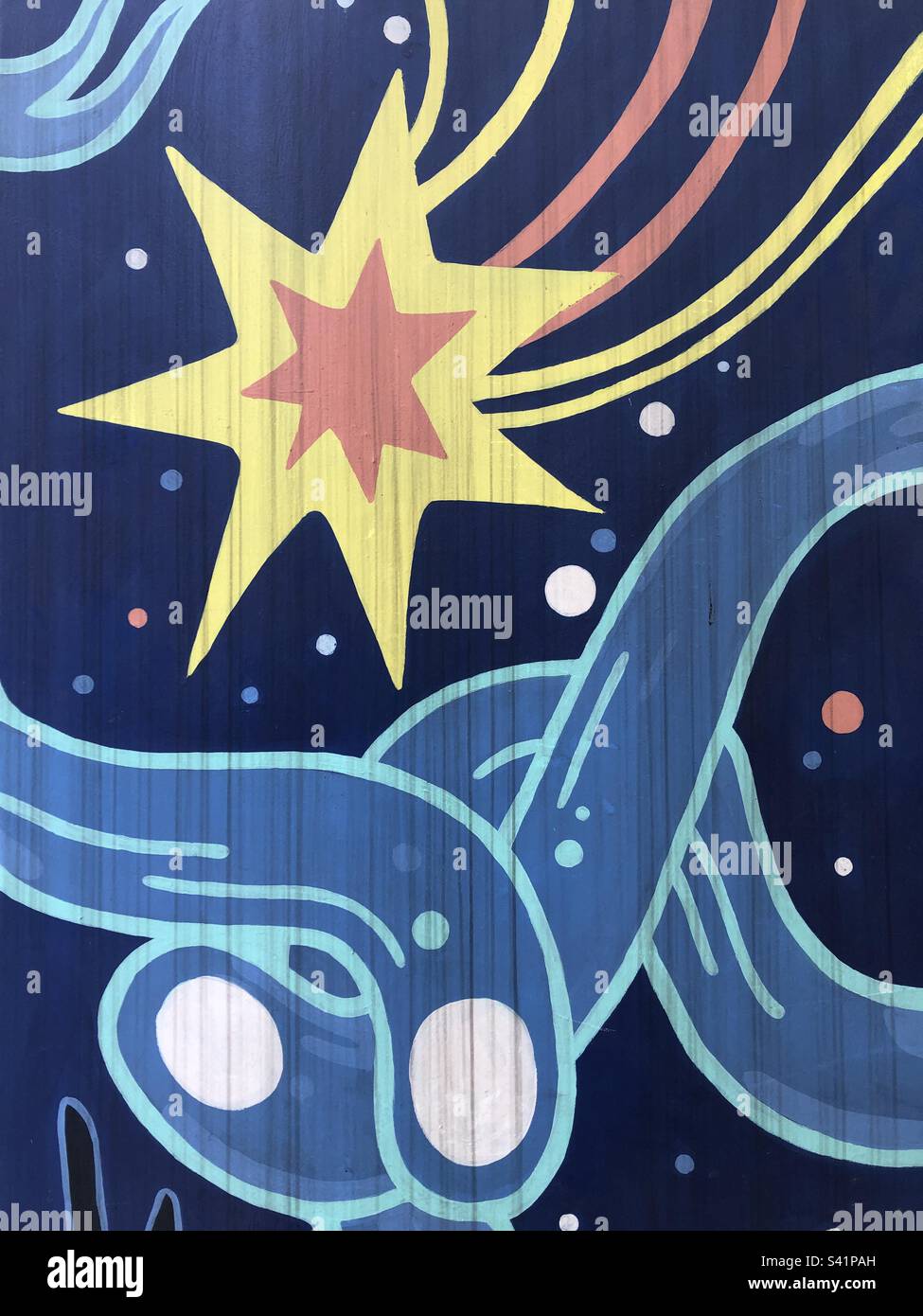 Cosmic themed street art Stock Photo - Alamy