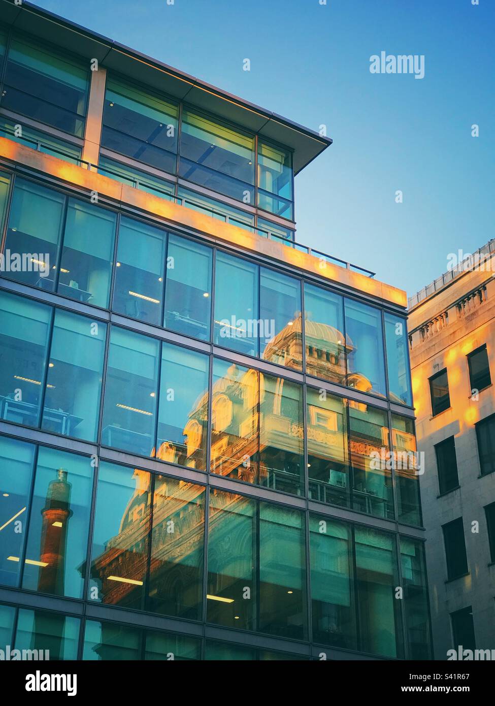 Buildings reflected onto other buildings in Victoria, London Stock ...