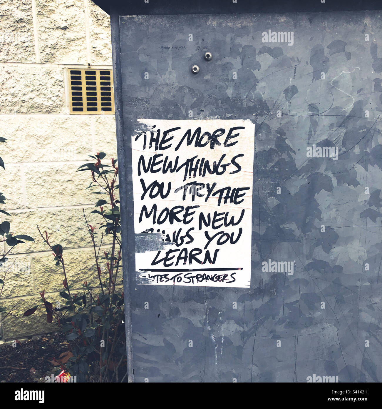 Notes to strangers quote try new things london Stock Photo - Alamy